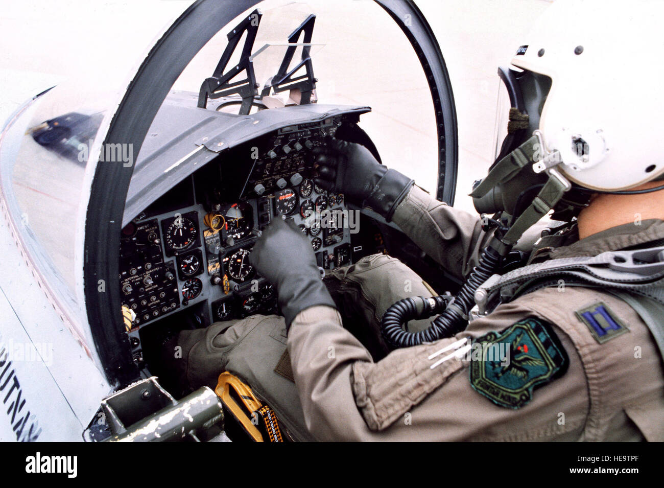 Captain Doug Moss does a pre-flight cockpit check of his F-15D Eagle ...
