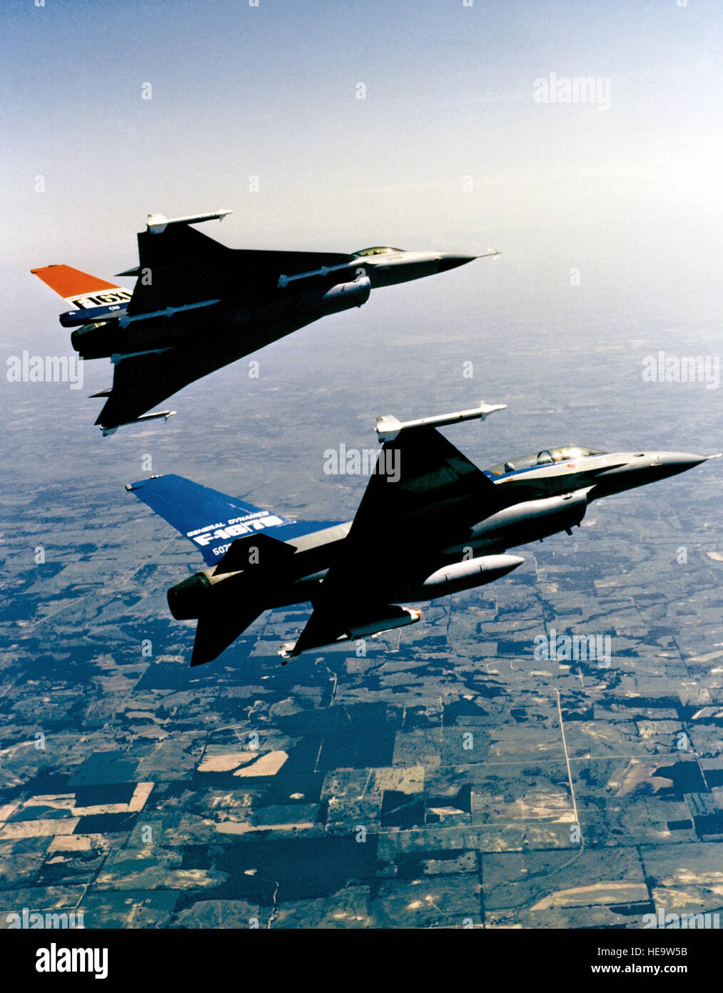 An F-16XL Fighting Falcon aircraft, armed with AIM-9 Sidewinder and AIM ...