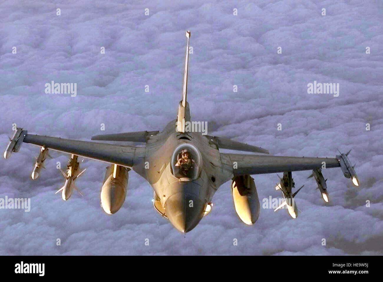 An US Air Force (USAF) F-16 Fighting Falcon aircraft patrols the no fly ...