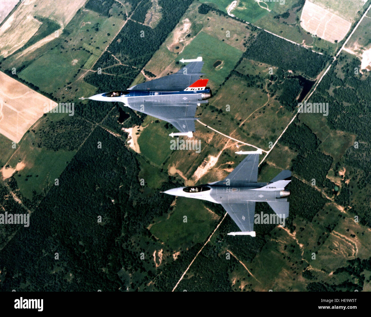 An air-to-air top left view of an F-16XL prototype and the F-16 ...