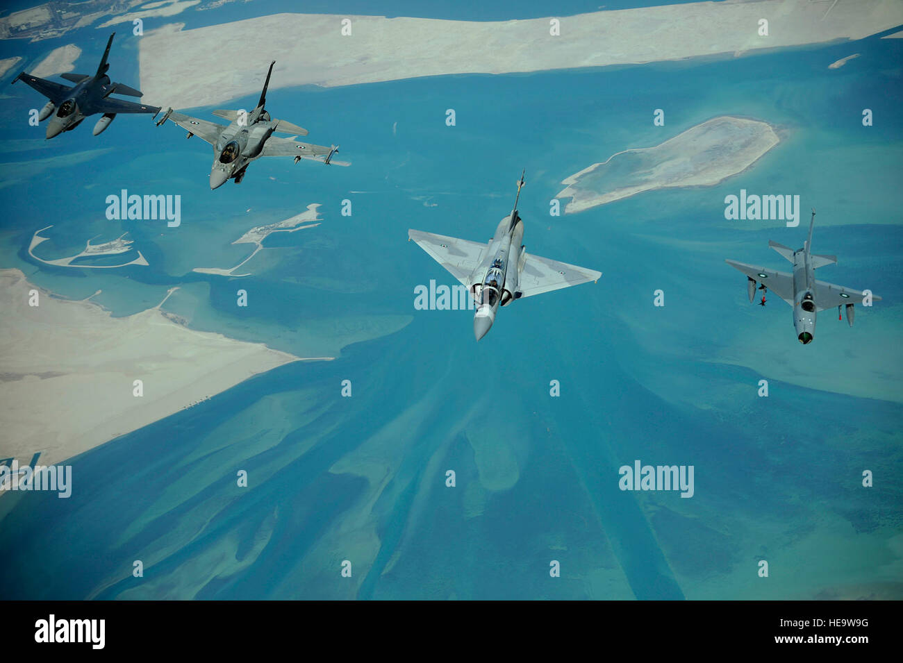 Emirati F-16s, Mirage 2000, and a Pakistani F-7 fly in formation during ...