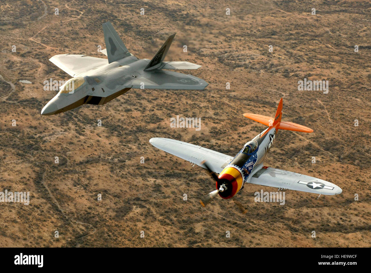 A World War II-era P-47 Thunderbolt and an F-22A Raptor from Langley ...