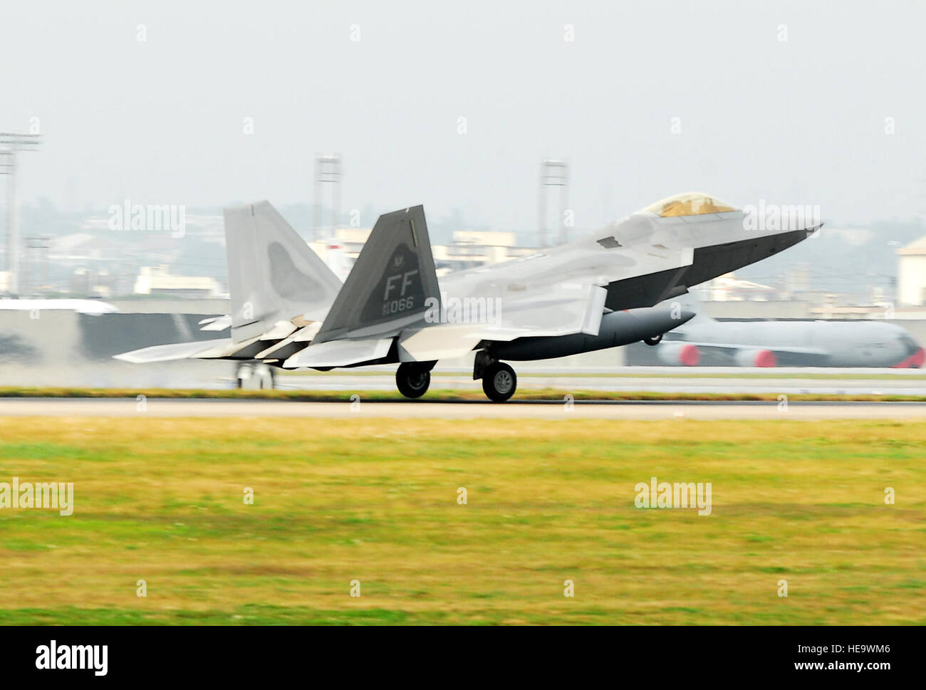 An F-22 Raptor lands at Kadena Air Base, Japan, Feb. 18, marking the ...