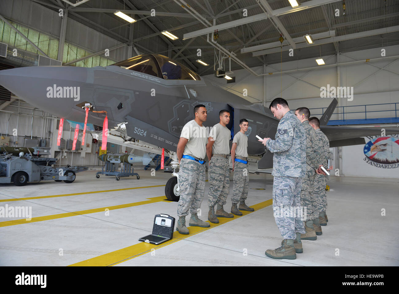 Judges brief load crew team members before an F-35A Lightning II load ...