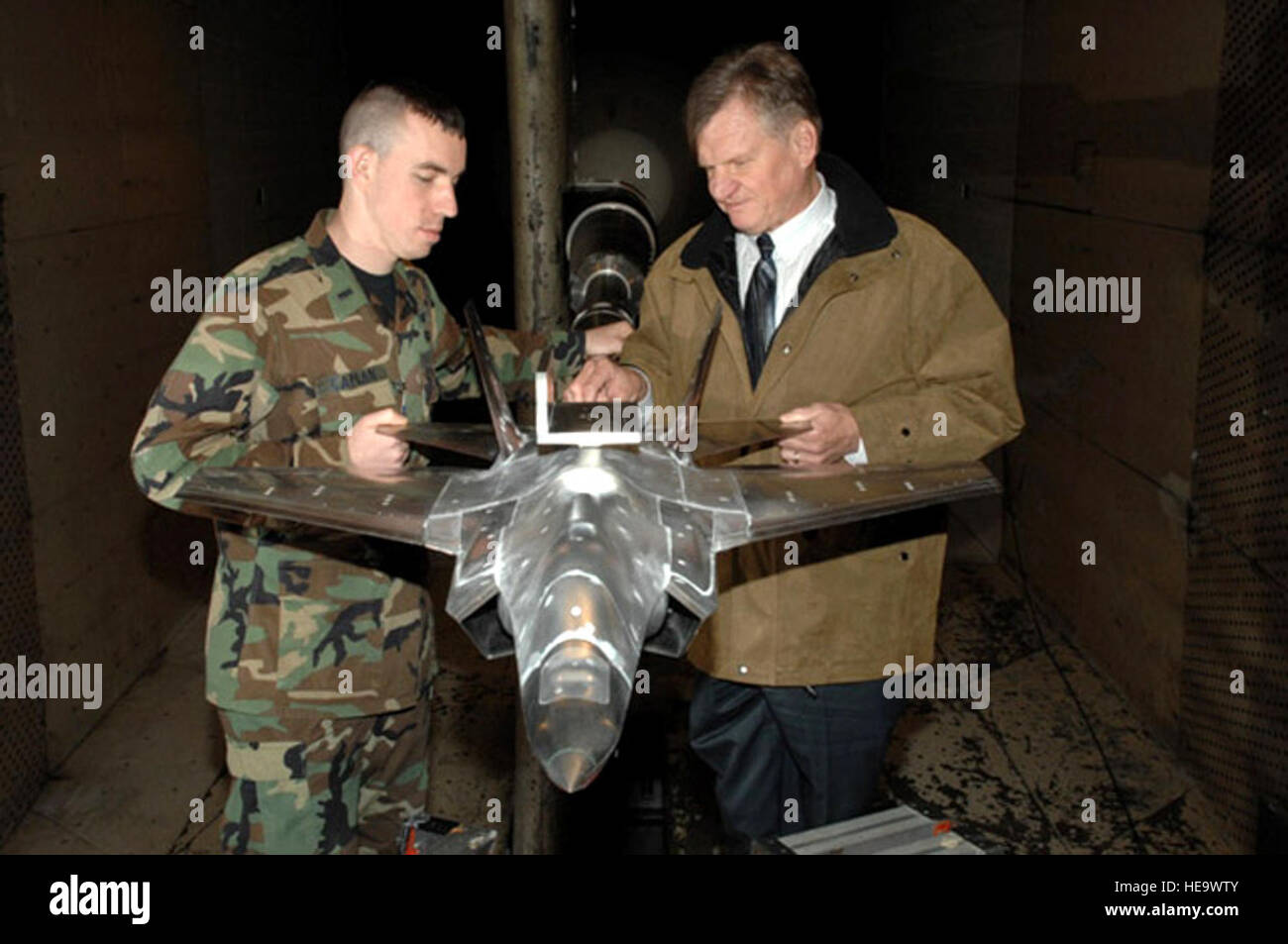 First Lt. Ezra Caplan and Charlie Smith examine a 12-percent scale ...
