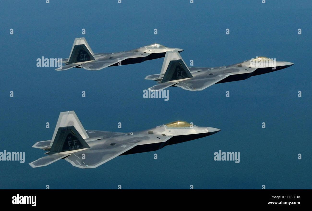 F-22 Raptors fly in formation. The Air Force's first four pilots to go ...