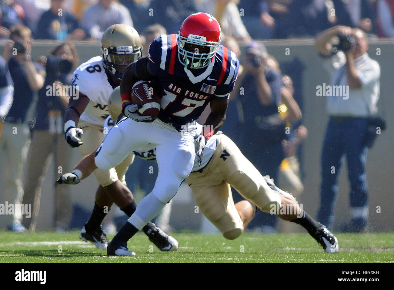 Junior running back Asher Clark breaks a tackle as Air Force defeated ...