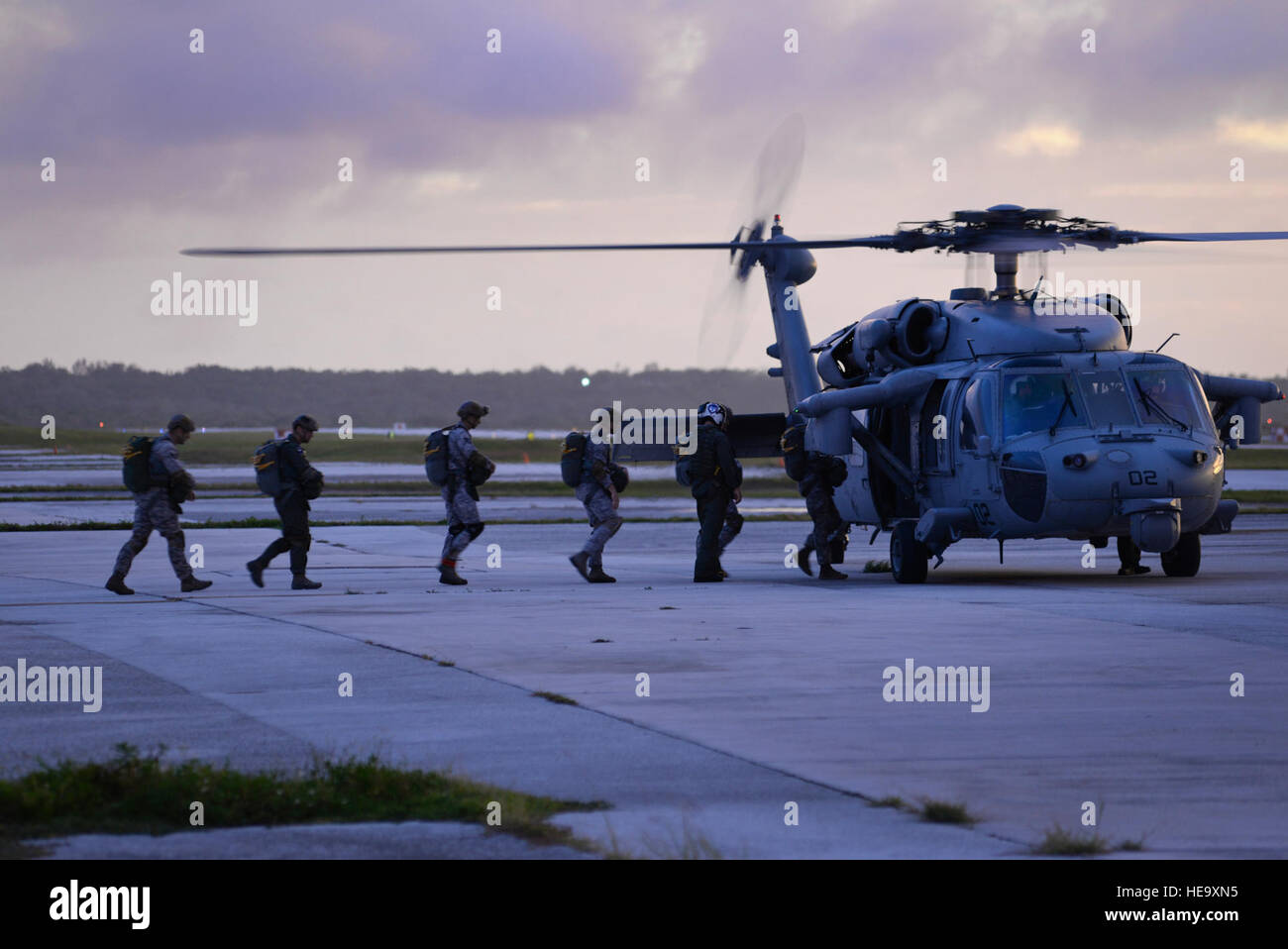 Members of the 736th Security Force Squadron board a MH-60 Sierra ...