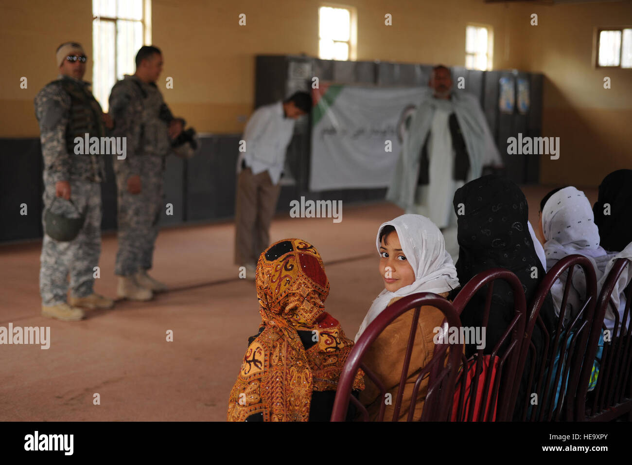 Glancing away from the Farah City Orphanage guests from the Farah ...