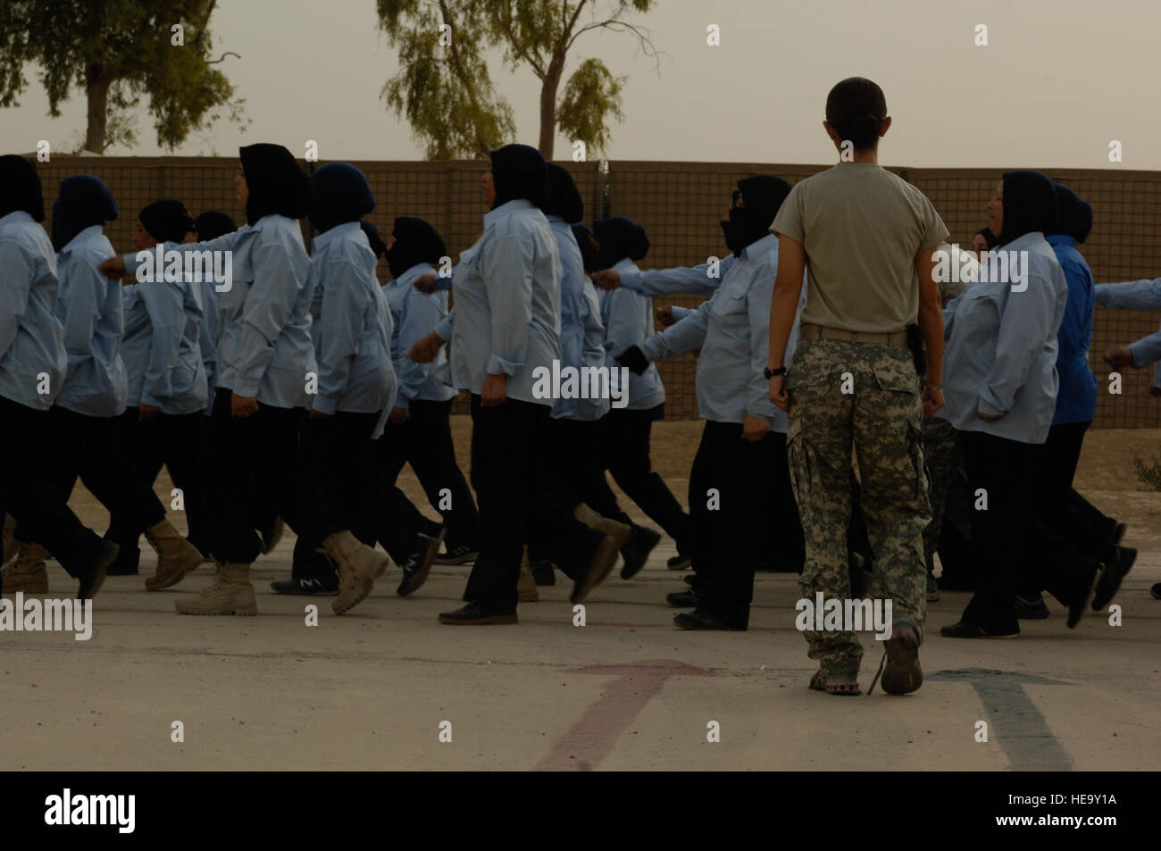 Female Iraqi trainees are marched by U.S. Army Sgt. 1st Class Sumalee ...