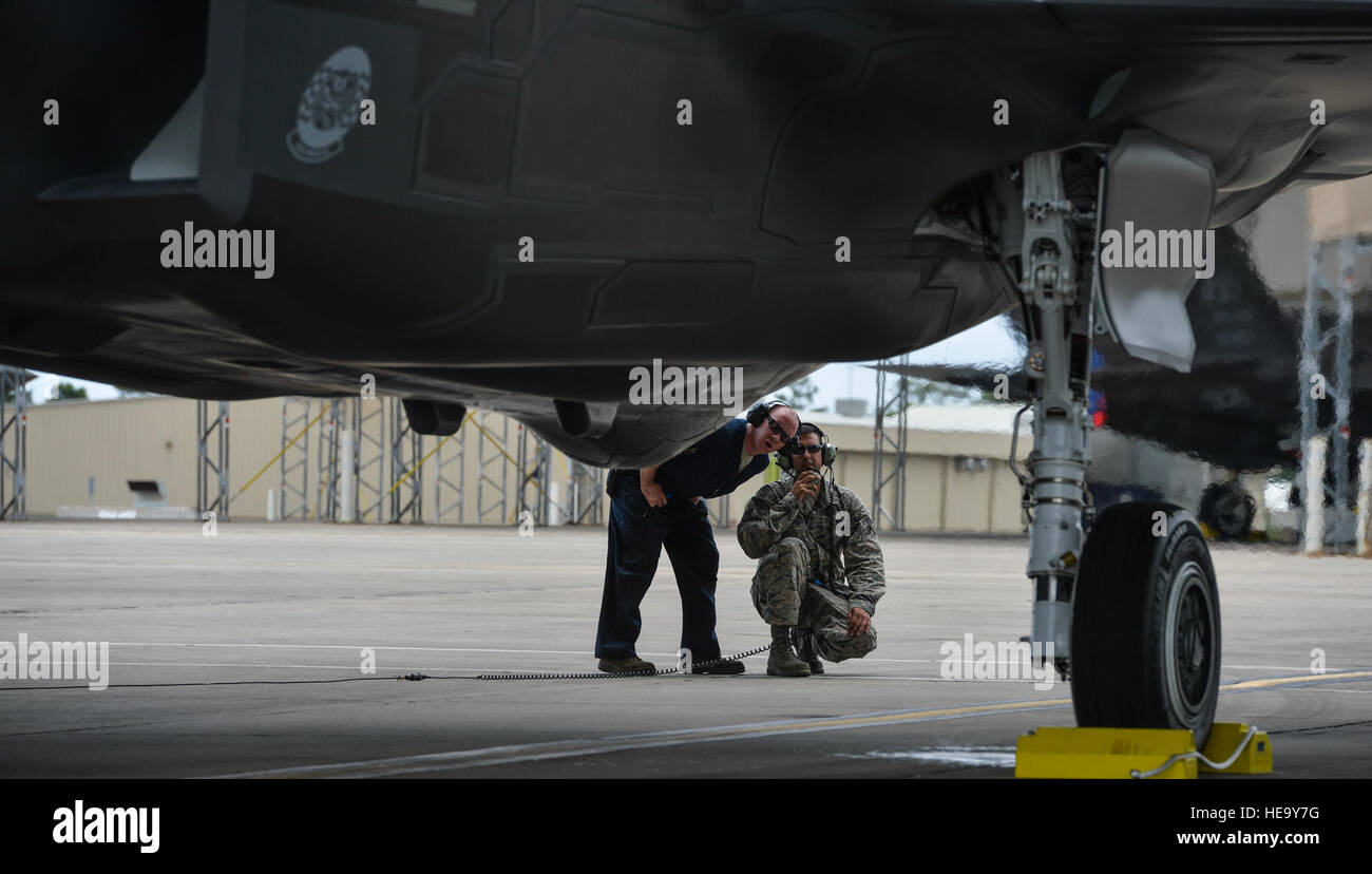 Airmen from the 58th Aircraft Maintenance Unit look over the 26th and ...