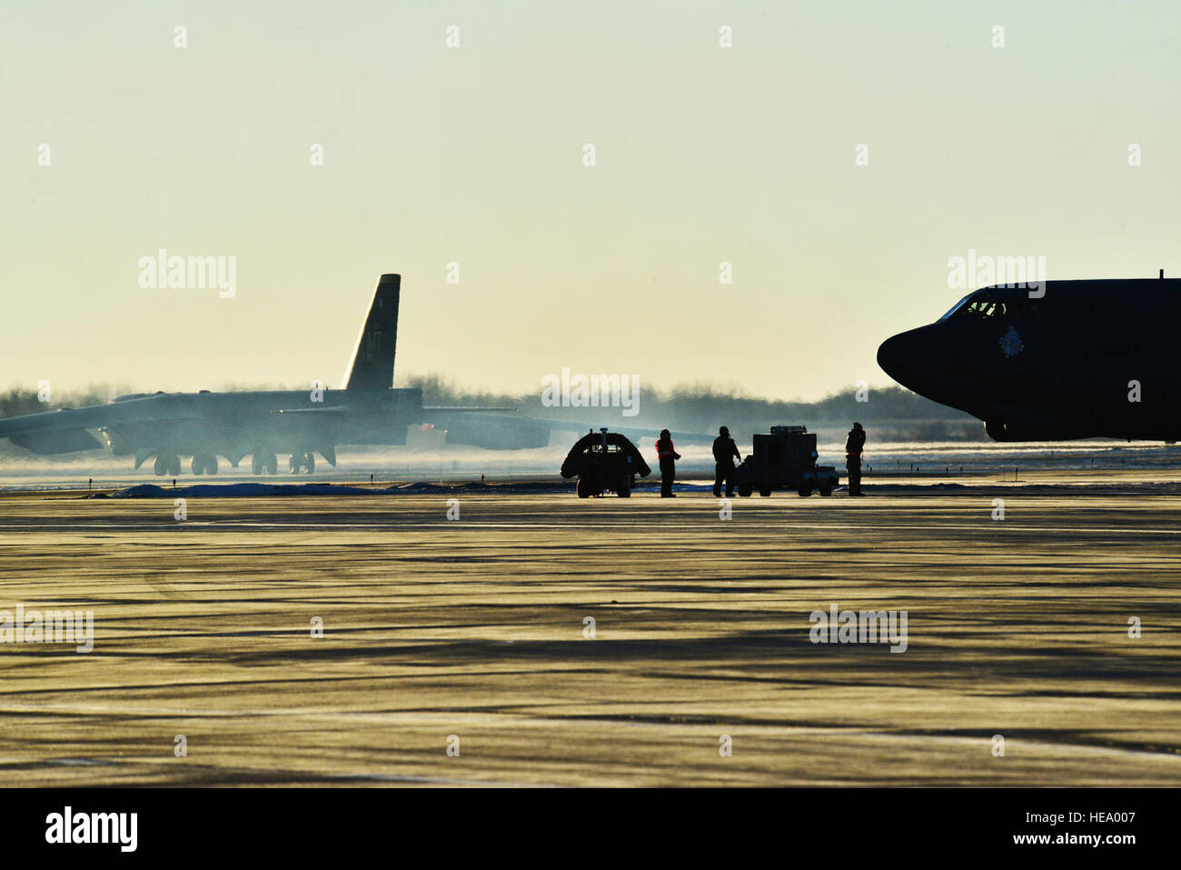Airmen from the 5th Maintenance Group conduct maintenance on a B-52H ...