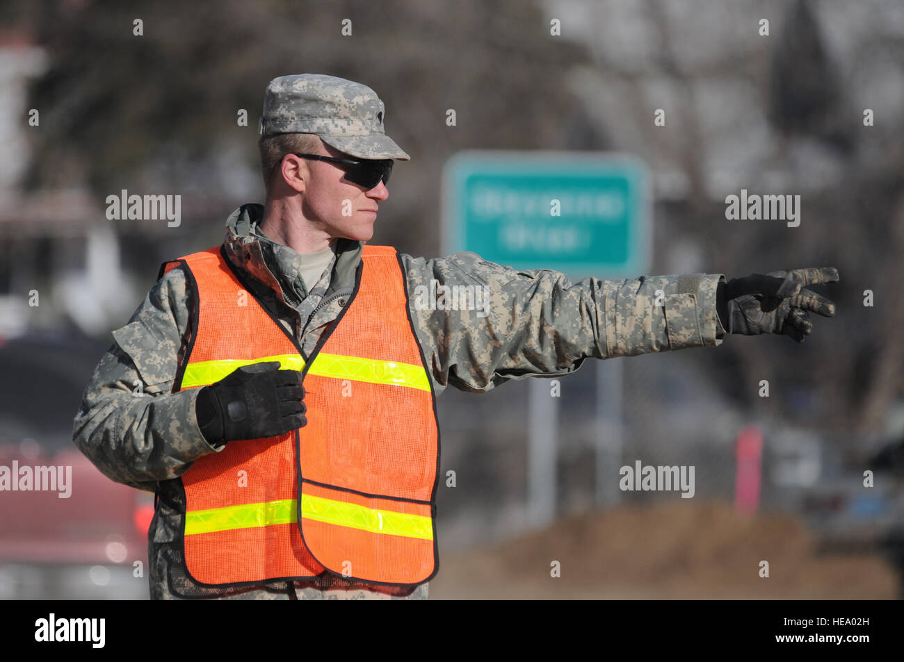 Spc. Danny Gross, of the 191st Military Police Company, directs traffic ...
