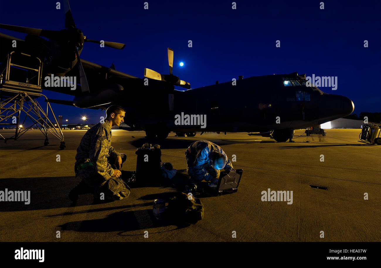 Senior Airman Christopher Hawkins and Airman 1st Class Eric Campbell ...