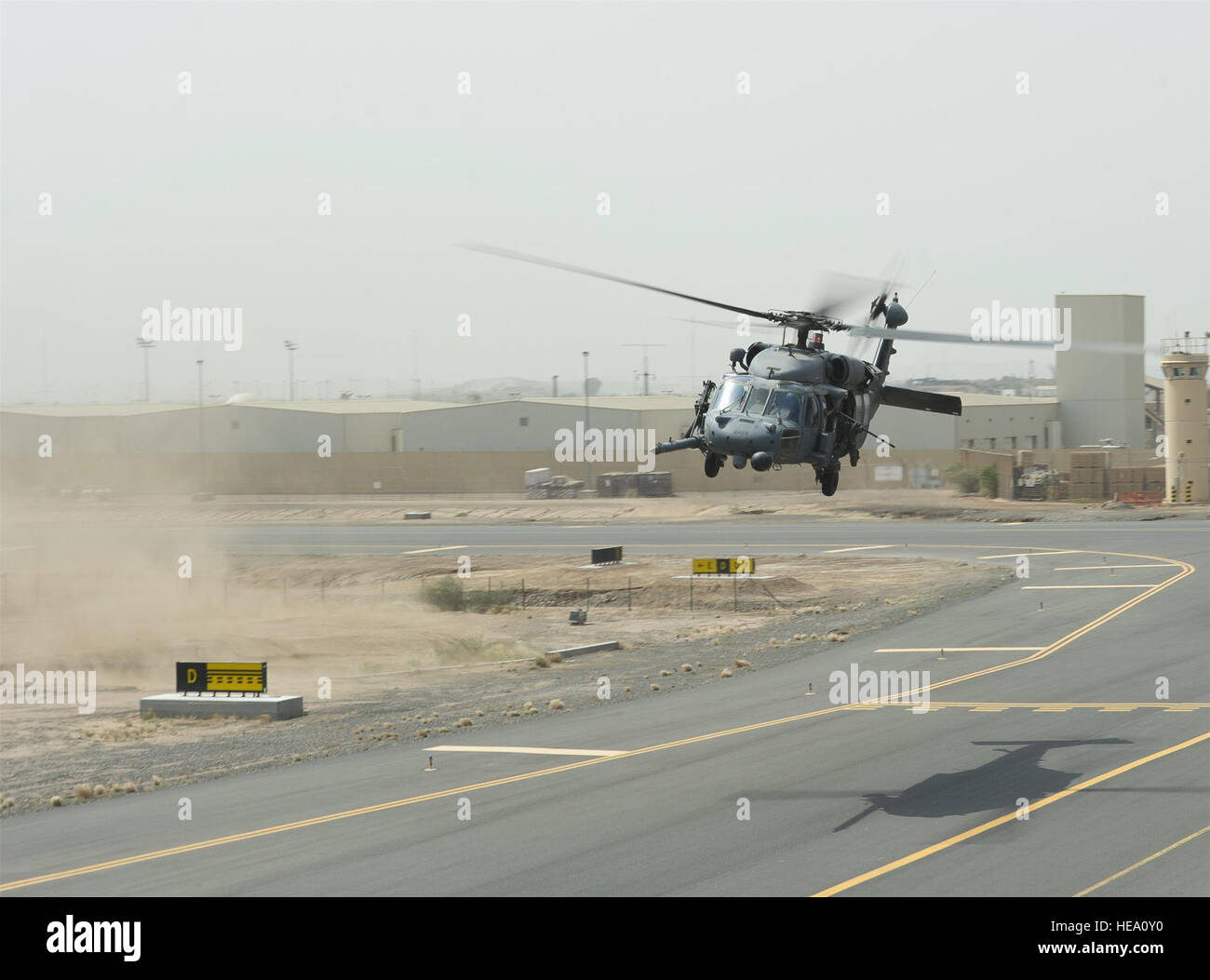 A U.S. HH-60 Pave Hawk helicopter takes off during a joint training ...