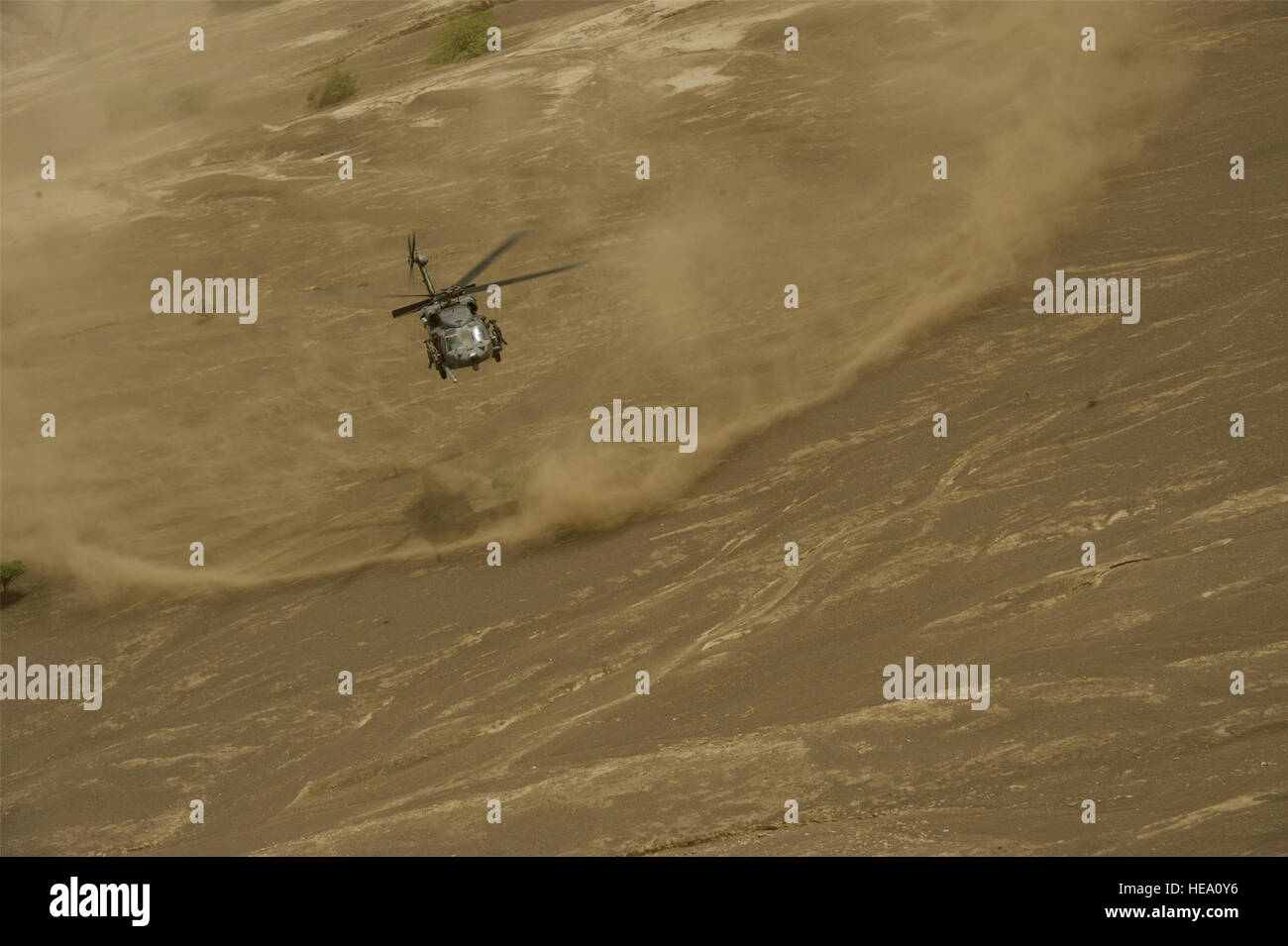 An HH-60 Pave Hawk from the 303rd Expeditionary Rescue Squadron lands ...