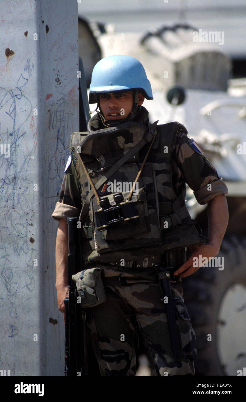 A United Nations peacekeeper standing watch on the streets of Sarajevo ...