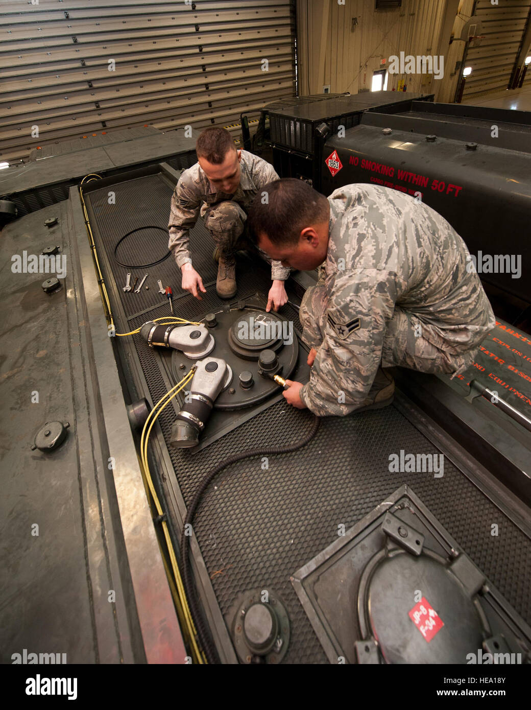 Senior Airman Phillip Laugle (left) and Airman 1st Class Ryan Harris ...