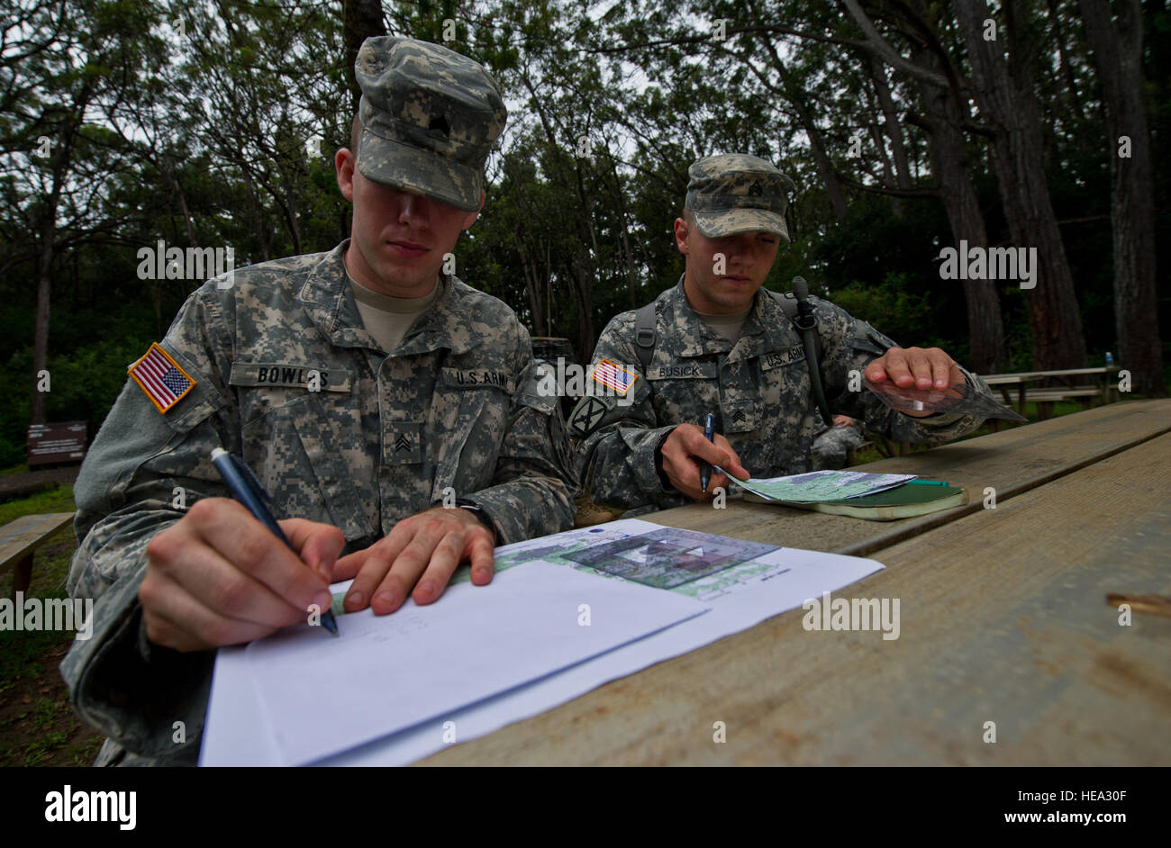 U.S. Army Sgt. Daniel Bowles and Sgt. Randal Busick, combat medics ...