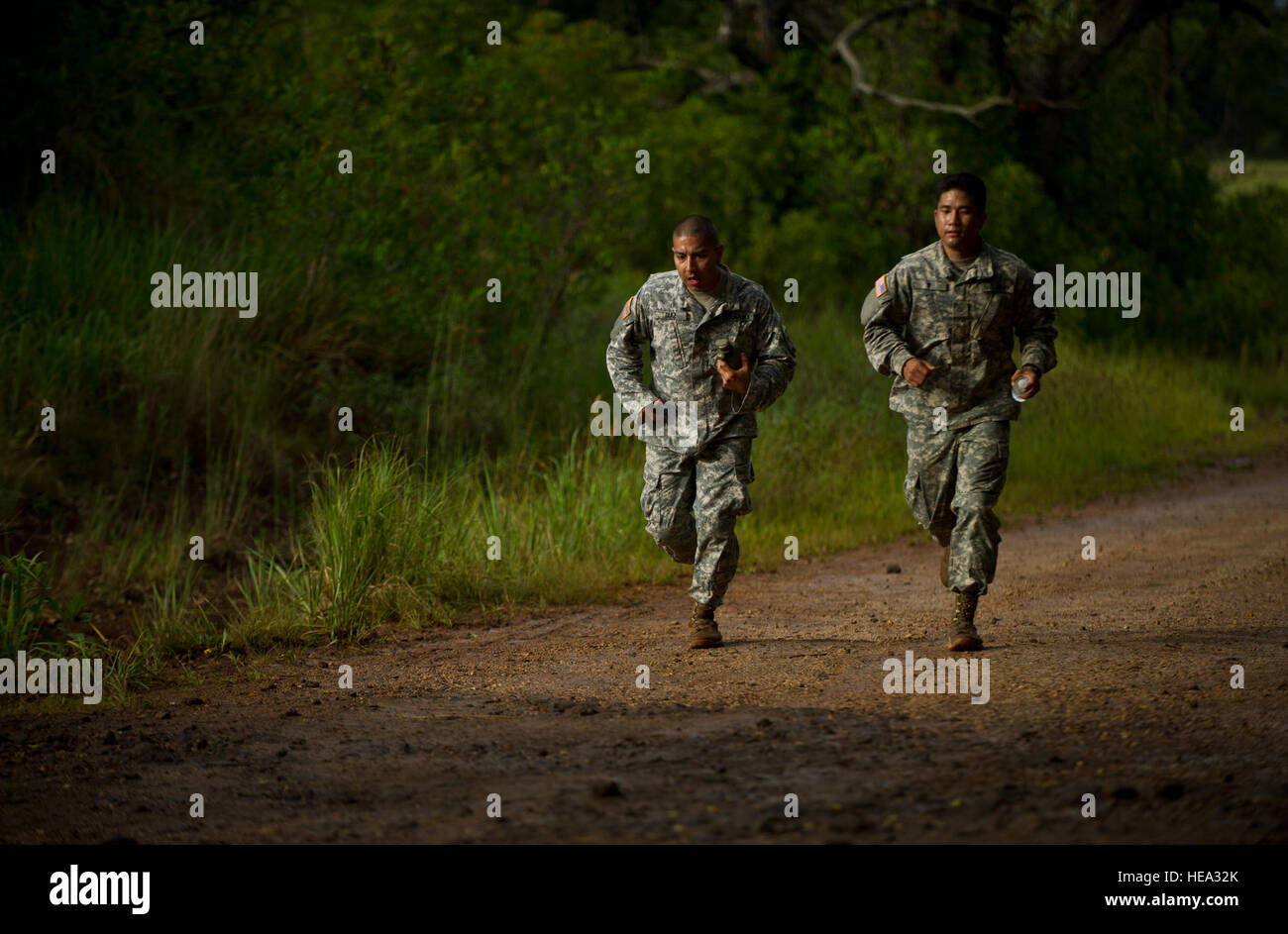 U.S. Army Sgt. Fernando Diaz, and Army Pfc. Joshua Yi, combat medics ...