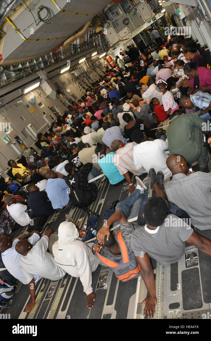 Passengers fill a C-17 Jan. 19, at the Toussaint L'Ouverture ...