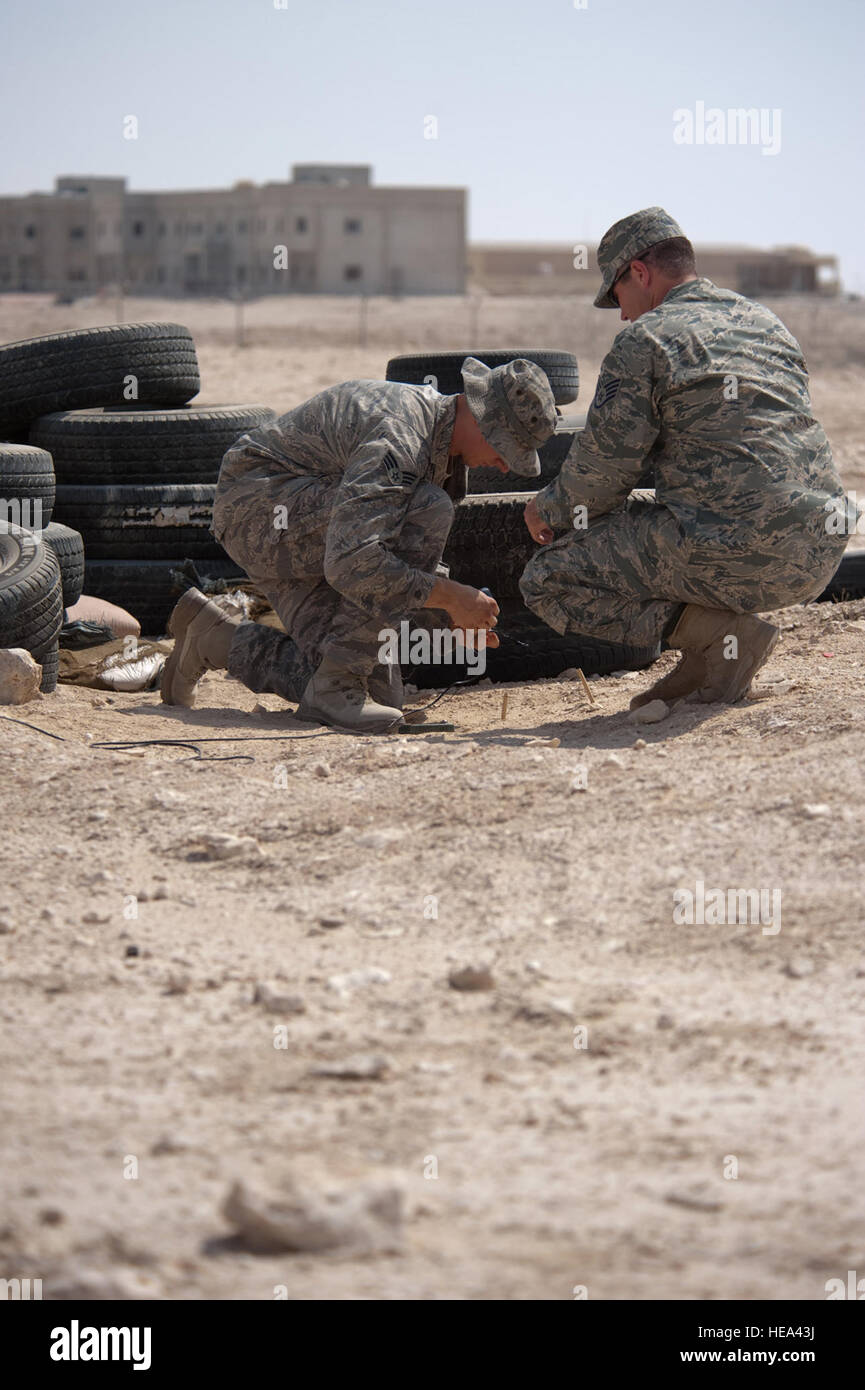 Left, U.S. Air Force Senior Airman Michael Ault and Staff Sgt. Michael ...