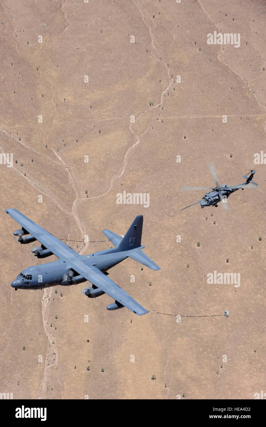Airmen with the 79th Rescue Squadron conduct a refuel mission with the ...