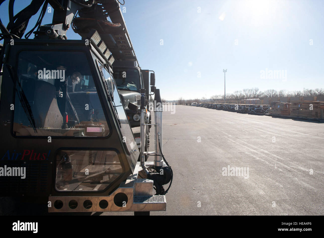 A de-ice truck sits in the oversized vehicle staging area on the flight ...