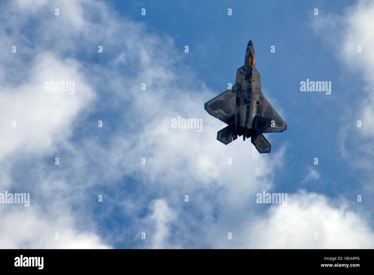 A U.S. Air Force F-22 Raptor performs a vertical climb during the 2016 ...
