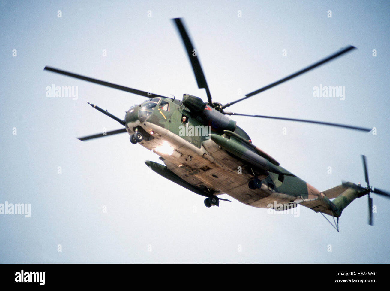 Left side view of an HH-53 Super Jolly helicopter in flight during ...