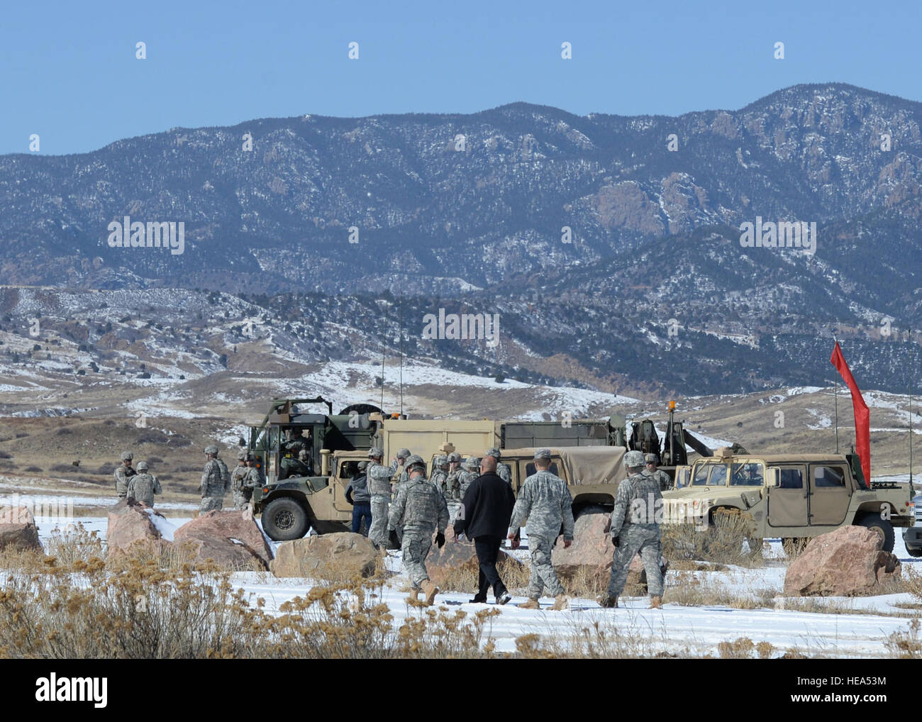 U.S. Army Soldiers gather a safe distance from the launch site of 12 ...