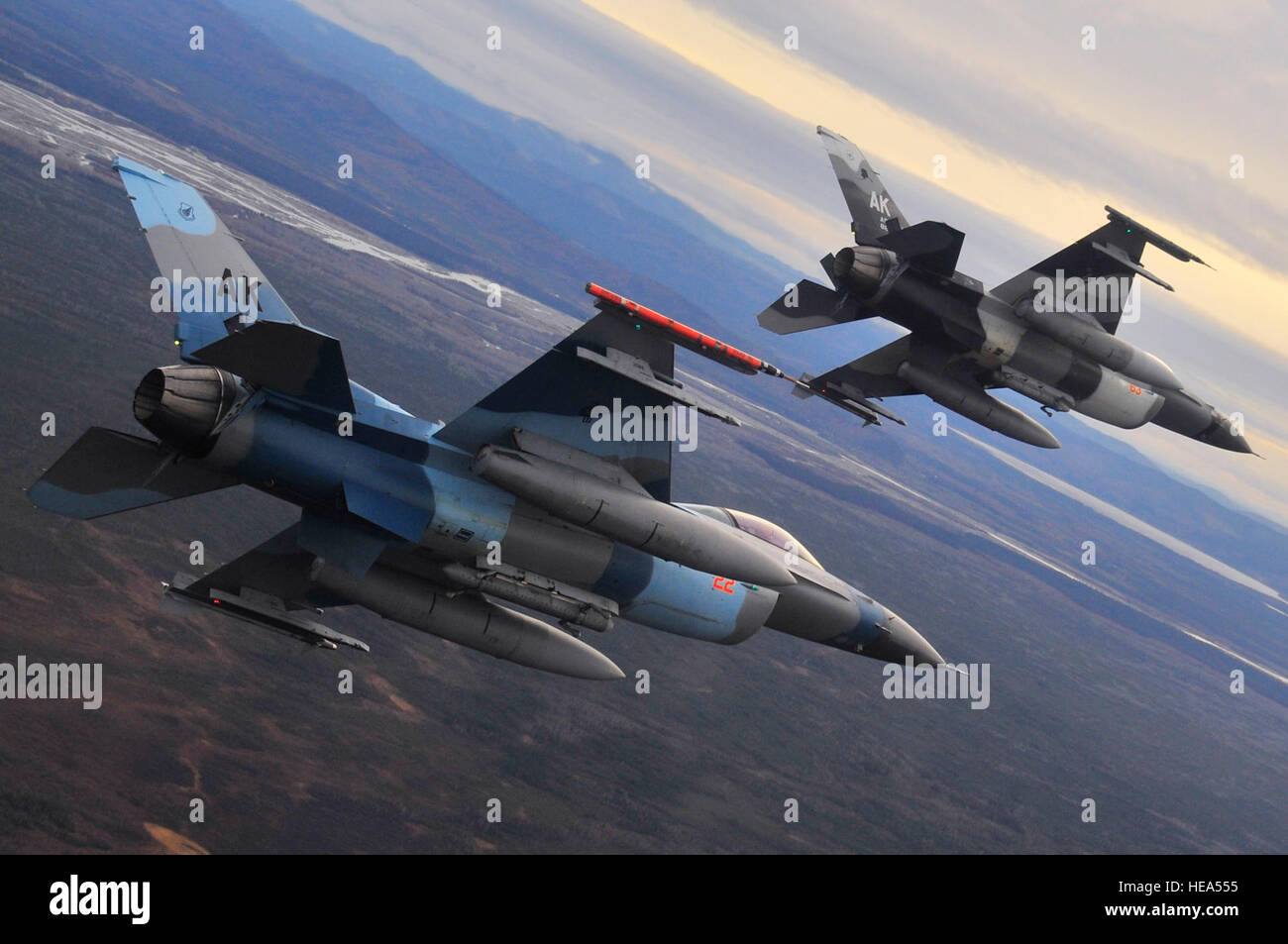 U.S. Air Force F-16 Aggressor aircraft fly over the Joint Pacific ...