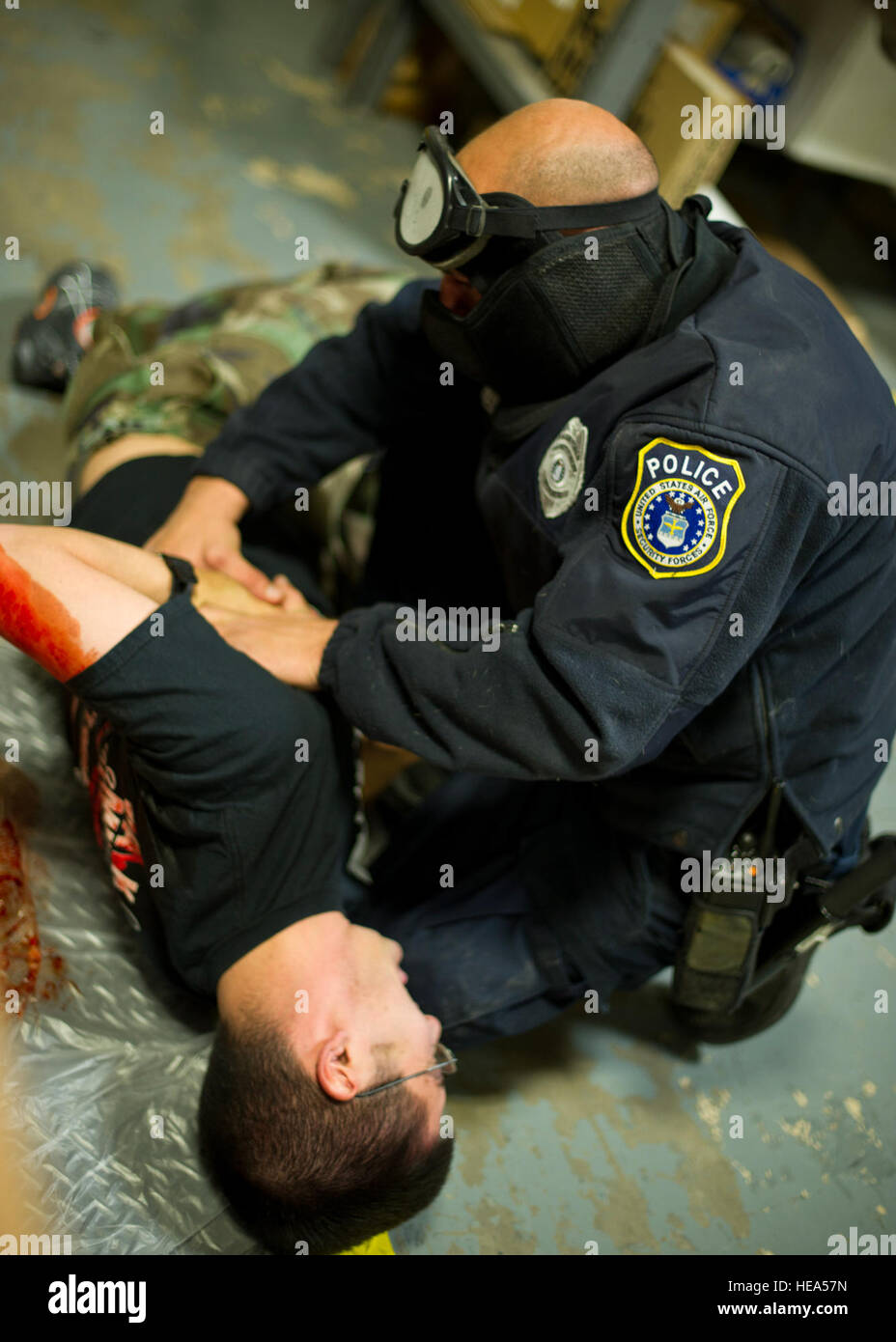 A responder prepares a simulated casualty for emergency medical ...
