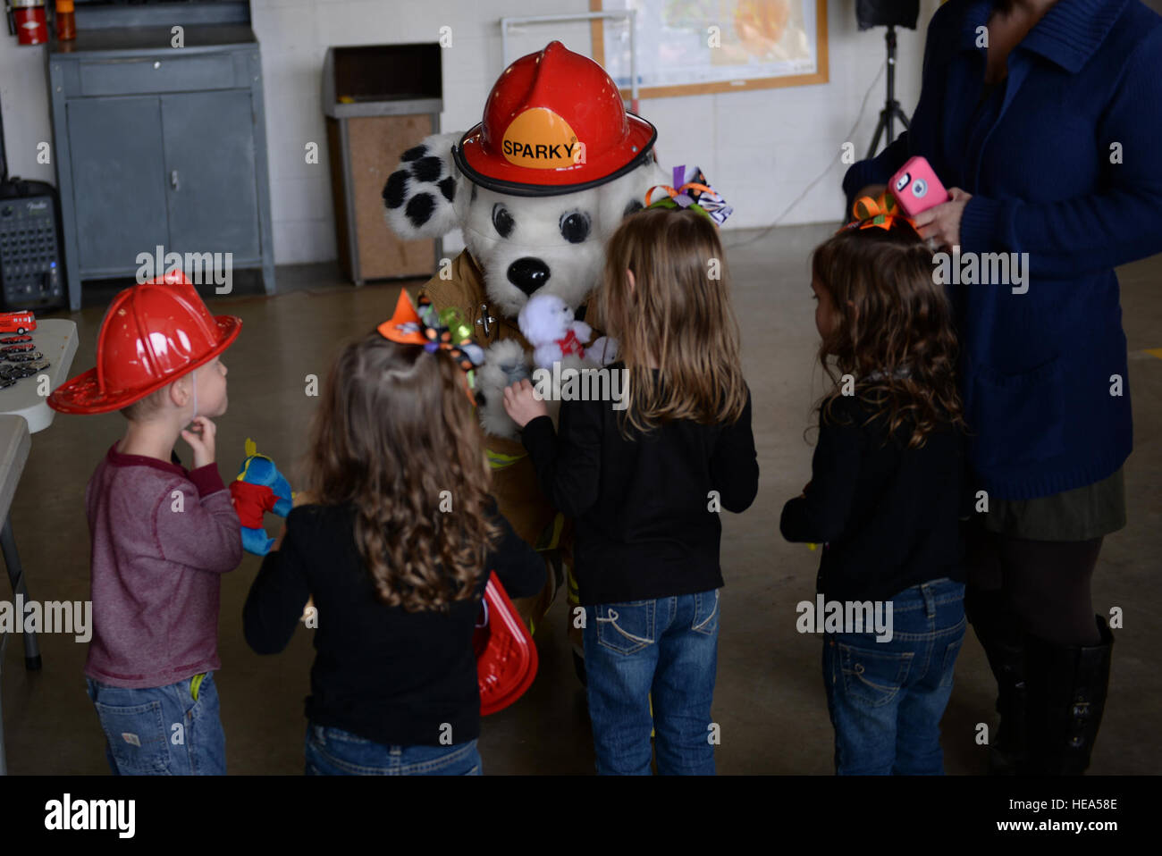 Sparky the Fire Dog greets children at the Firefighters’ Open House at ...