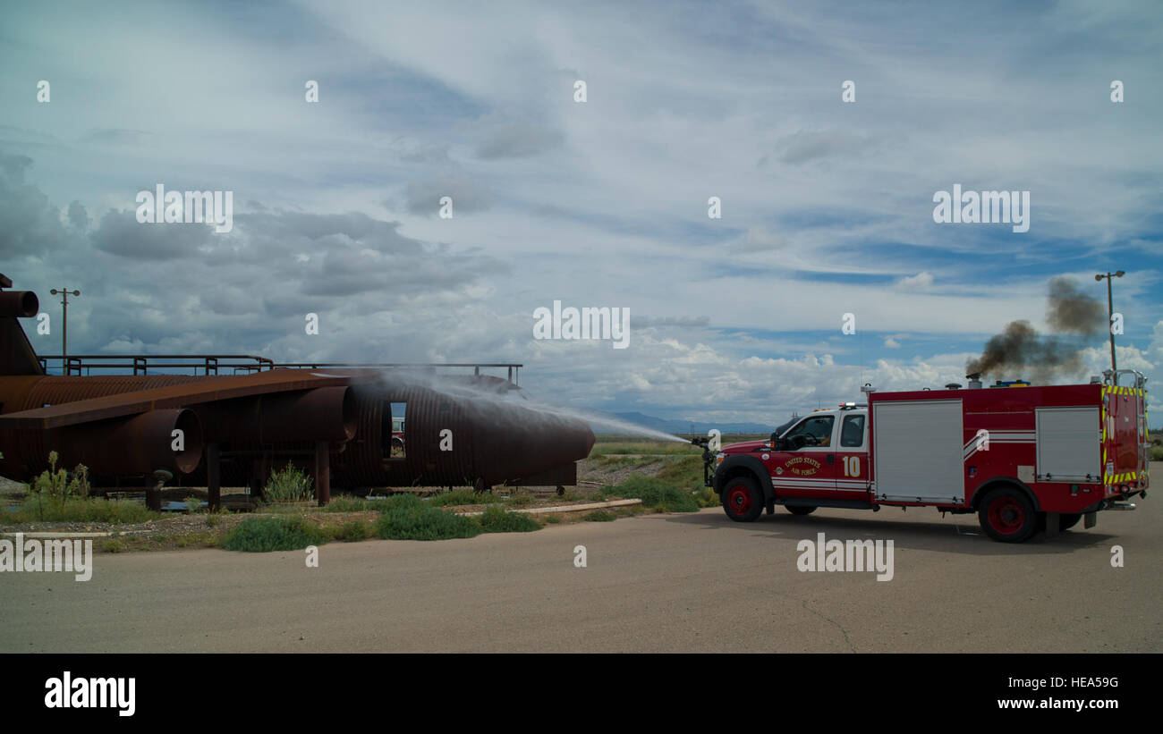 Members of the 49th Civil Engineer Squadron Fire Protection Flight ...