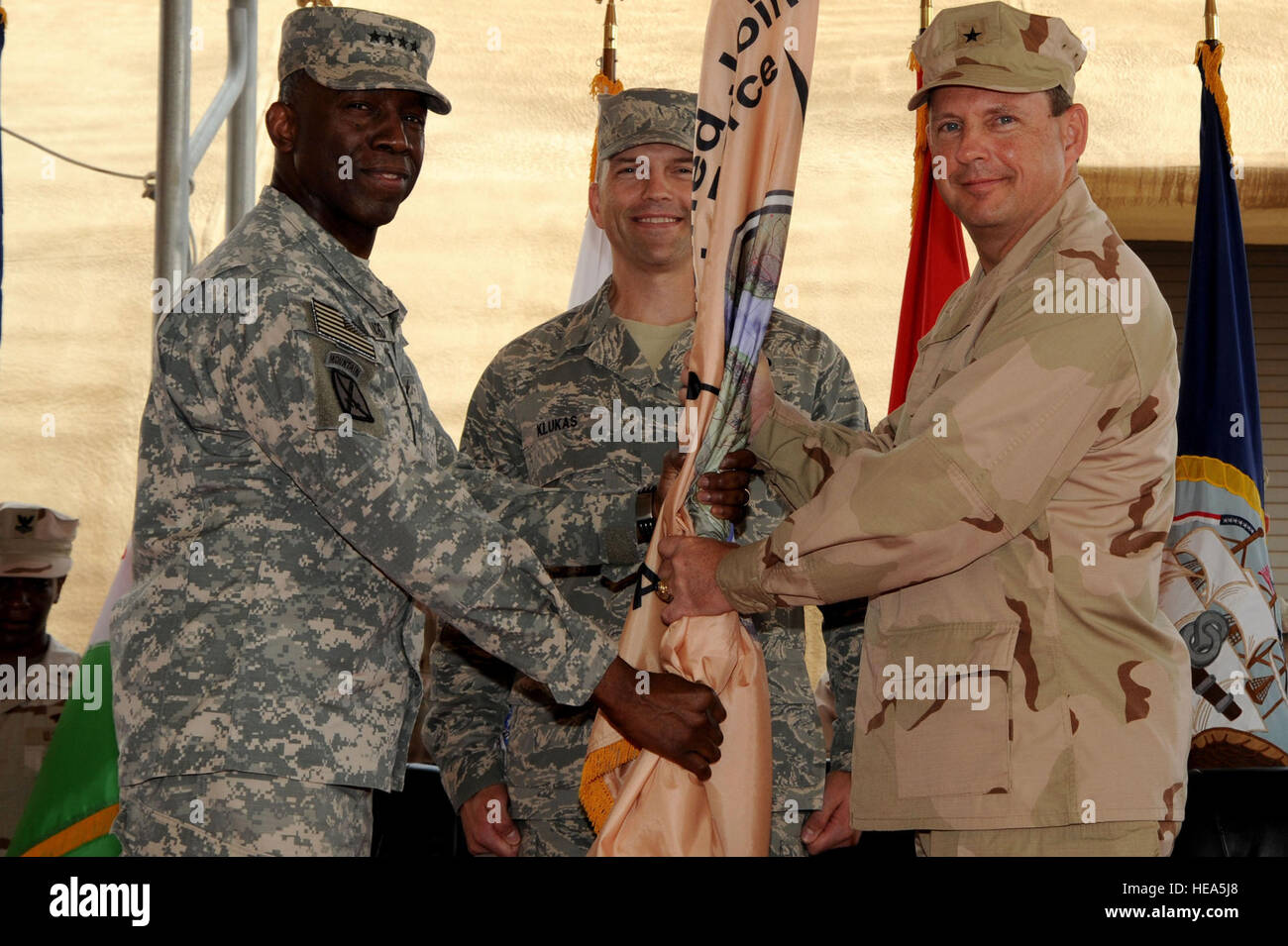 Rear Admiral Anthony M. Kurta recieves the flag from General William ...