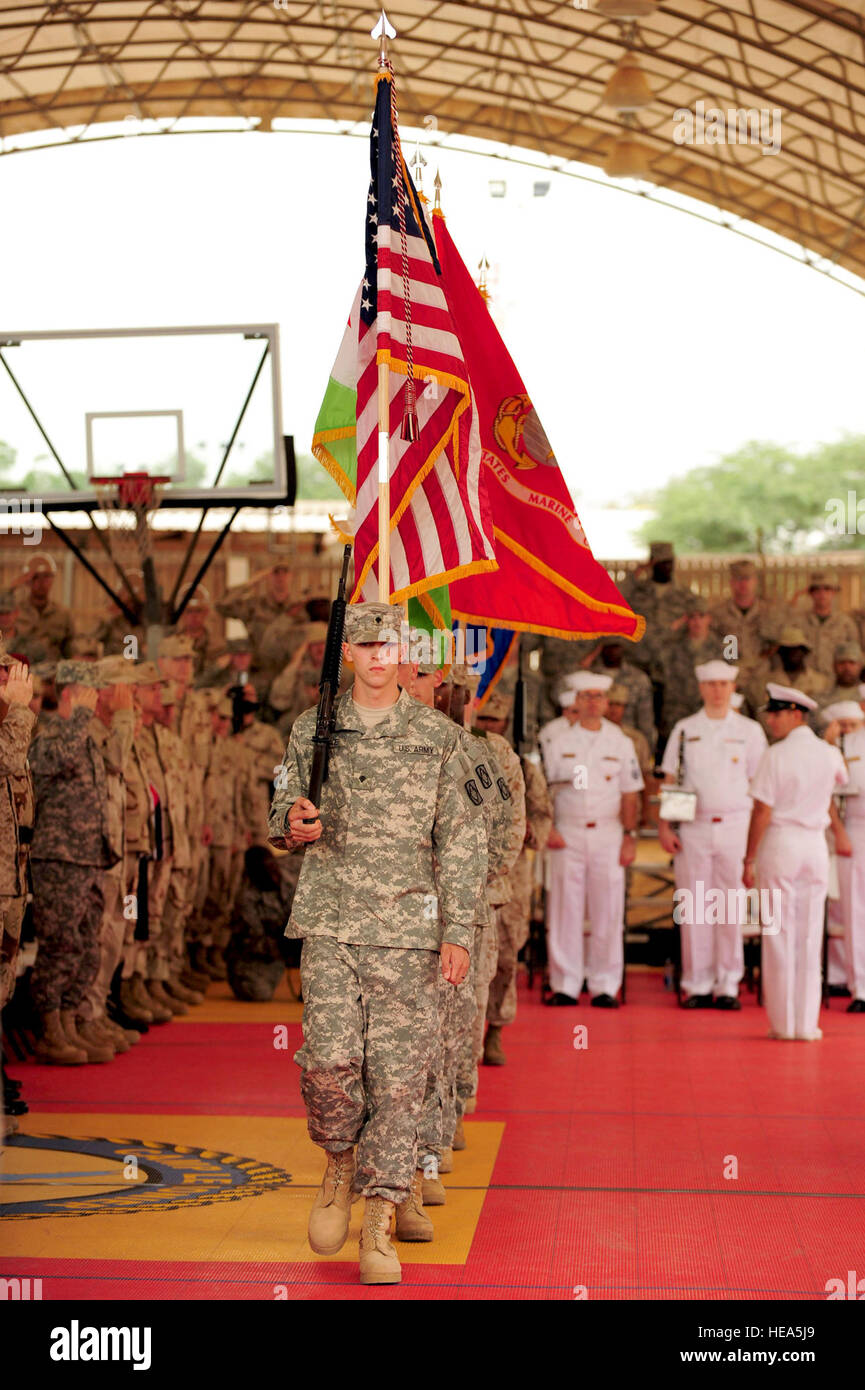 The Color Guard posts the colors during the change of command ceremony ...