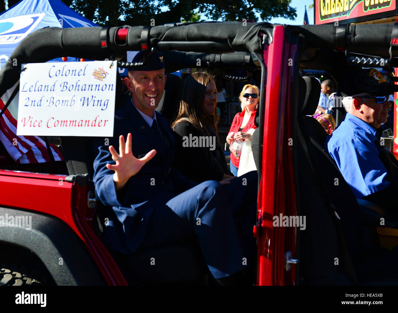 Col. Leland Bohannon, 2nd Bomb Wing vice commander, waves at a crowd ...