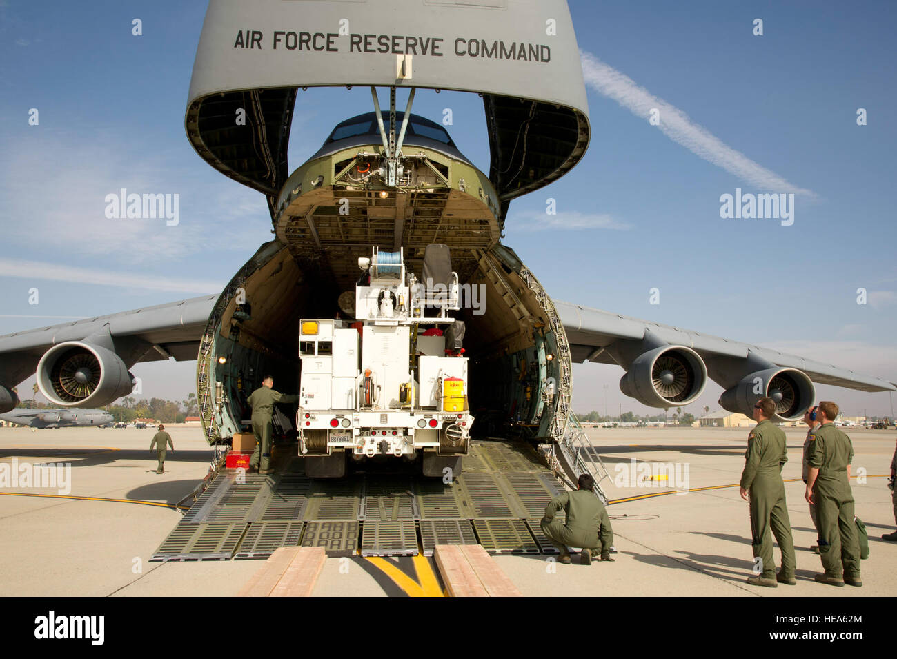 A Southern California Edison truck is loaded onto a U.S. Air Force C-5 ...