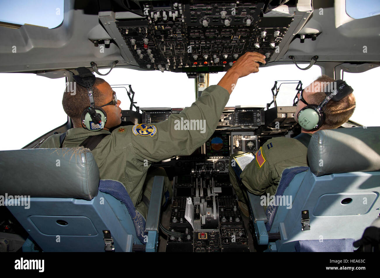U.S. Air Force Maj. Phil Dillingham, left, 301st Airlift Squadron and ...