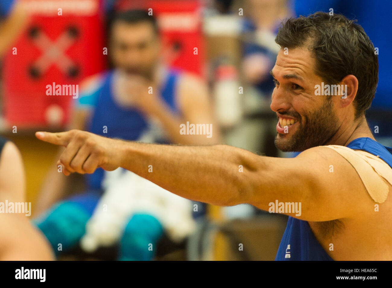Air Force athlete Ryan Pinney smiles after scoring a point in ...