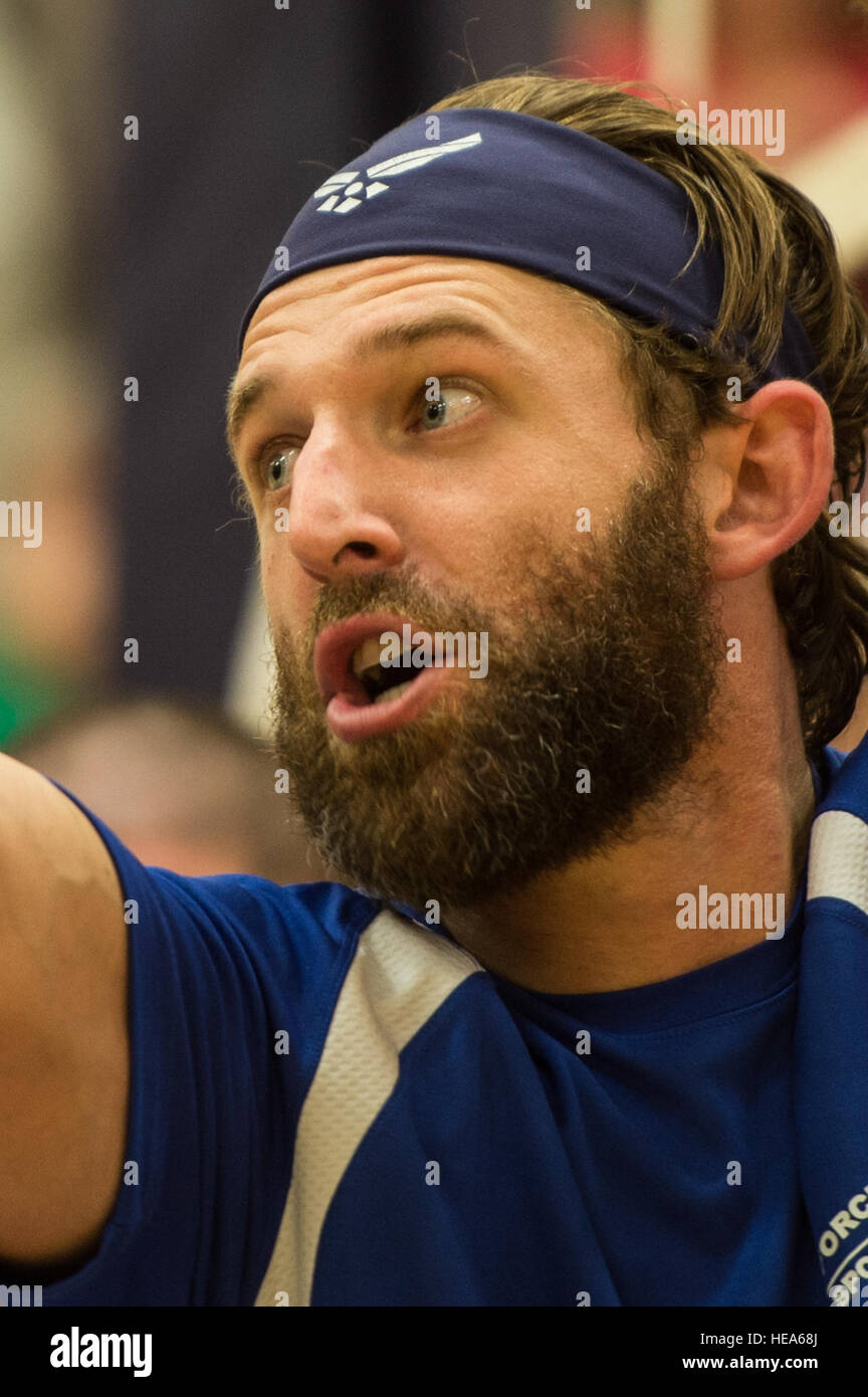 Air Force athlete Ryan Gallo participates in sitting volleyball during ...