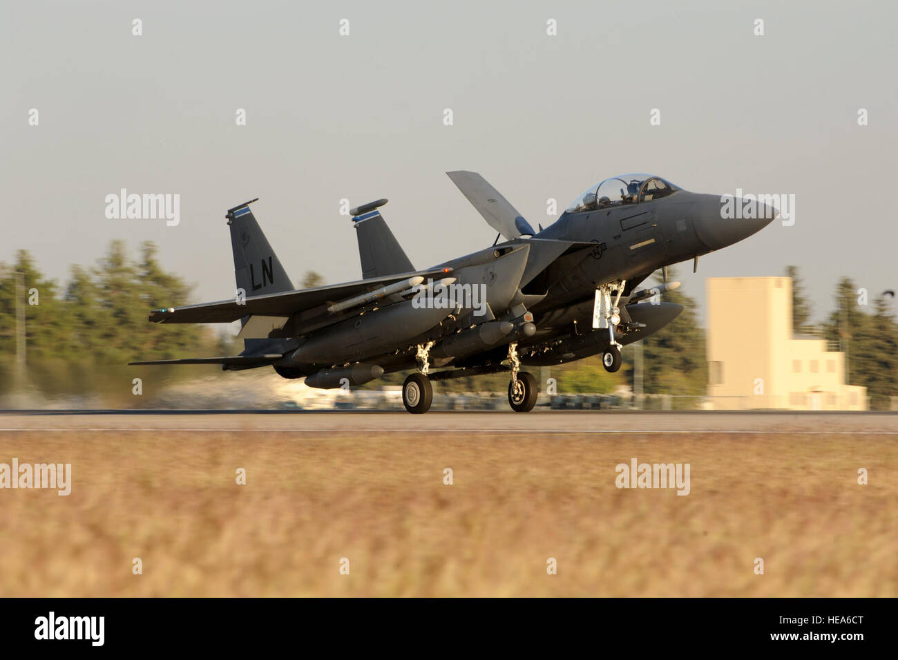 A U.S. Air Force F-15E Strike Eagle lands on the runway Nov. 12, 2015 ...