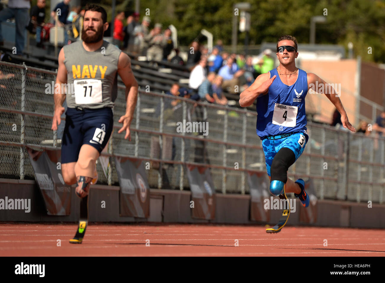 Air Force athlete Gideon Connelly (right) competes in track and field ...