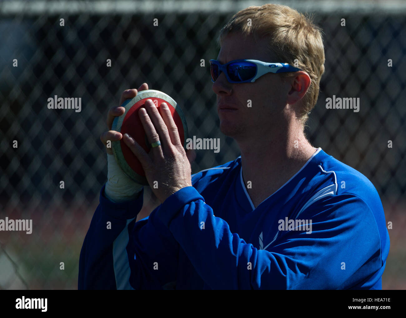Air Force athlete Matthew Burke prepares to throw the discus during the ...