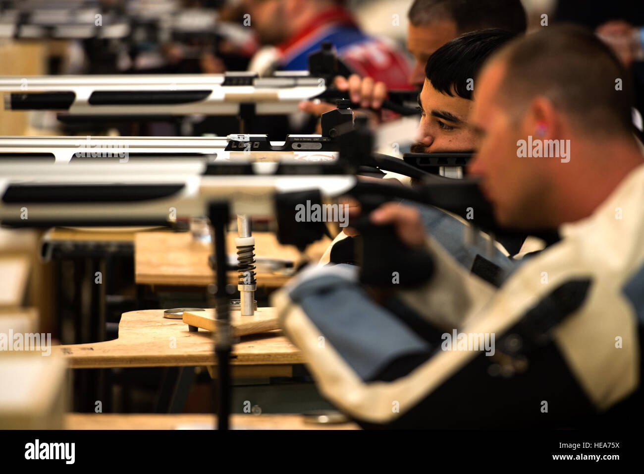 Air Force athlete Daniel Crane aims his rifle in a shooting competition ...
