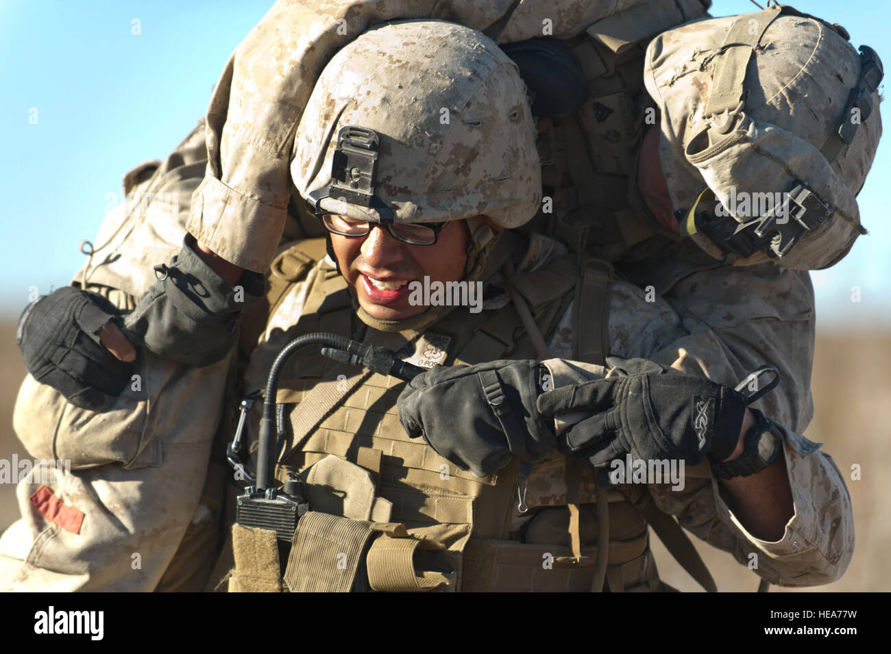 U.S. Navy Seaman Antonio Cordova Jr., a medevac corpsman transports a ...