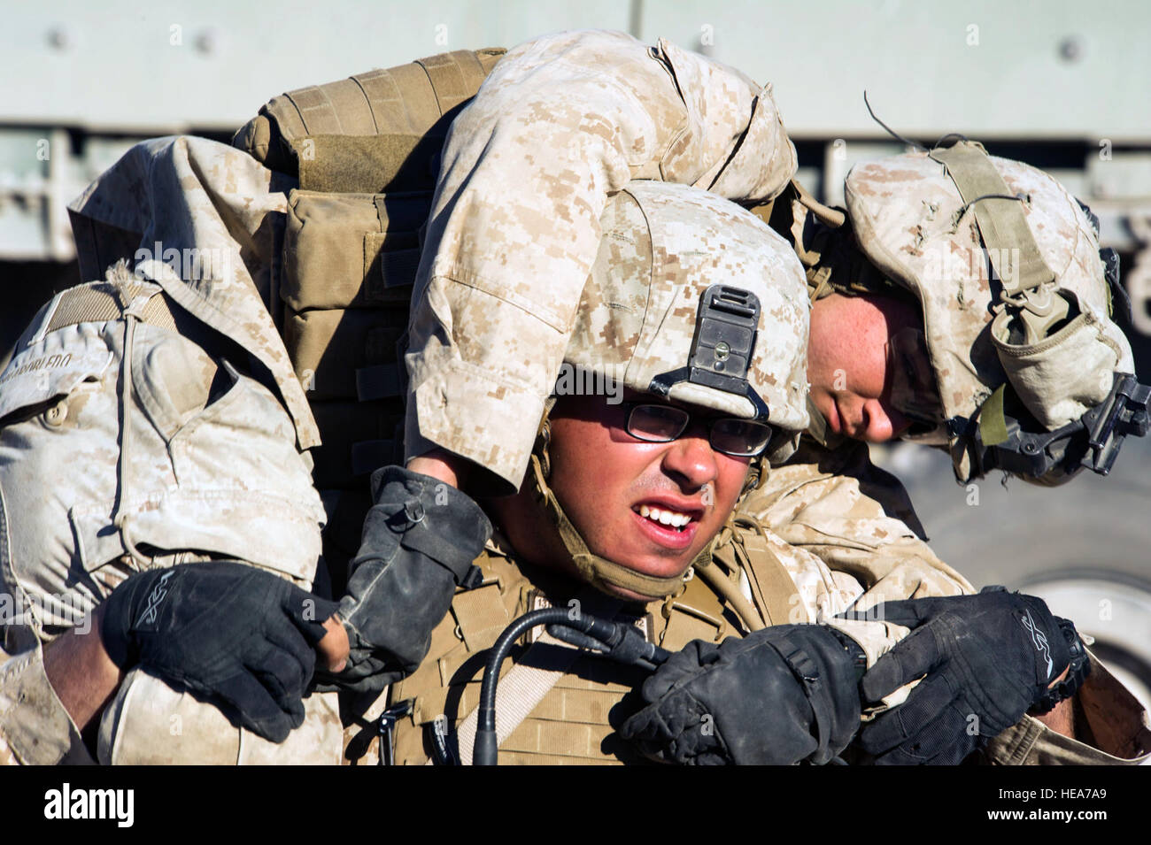 Firemans carry hi-res stock photography and images - Alamy