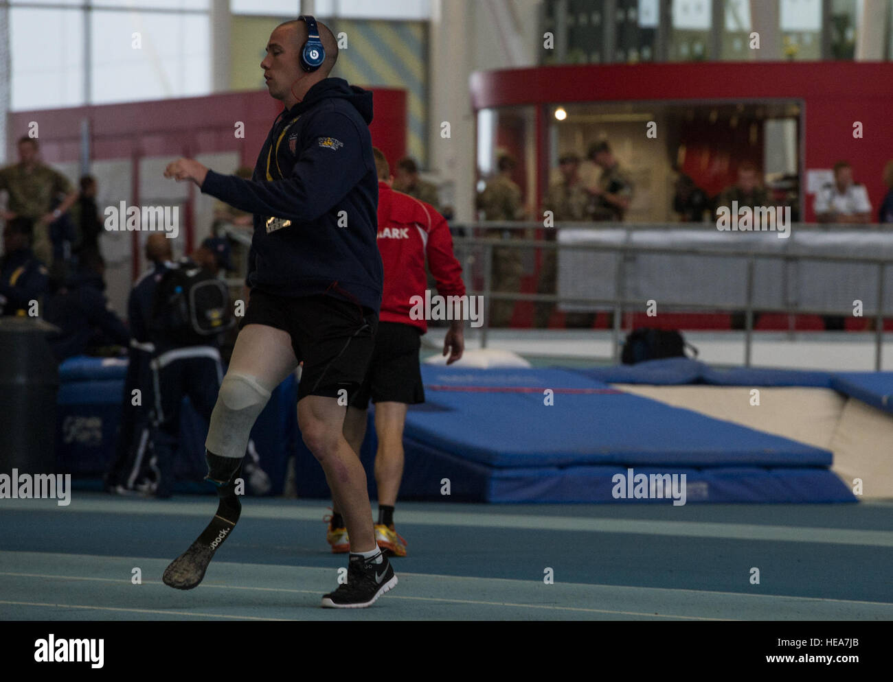 U.S. Army Sgt. Ryan McIntosh warms up before participating in the ...