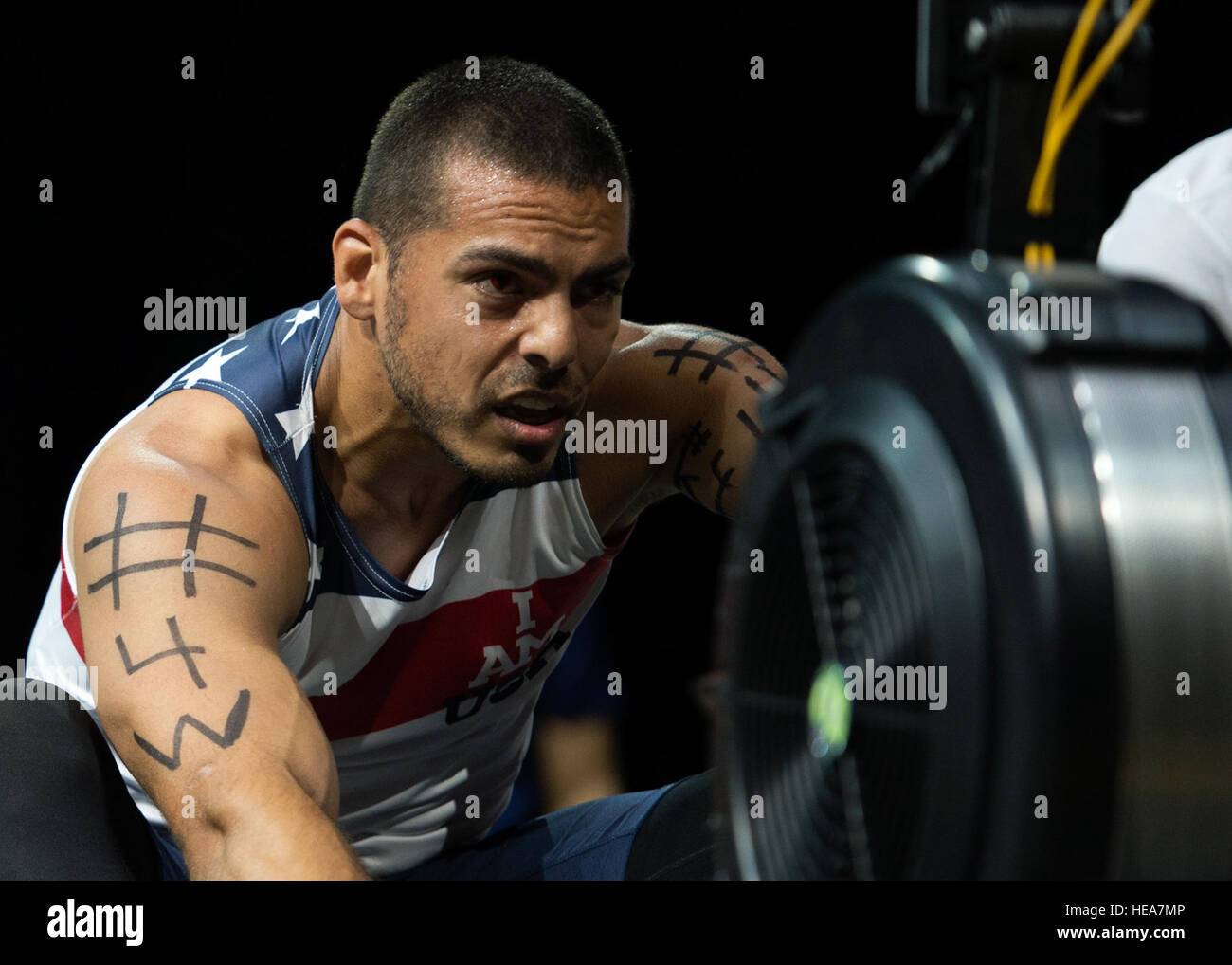 U.S. Army Staff Sgt. Michael Kacer competes in indoor rowing during the ...